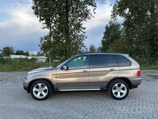 Brown BMW X5 2006 in Riga, with an engine capacity of 4.40 L and mileage of 0 thousand km for 6950 €, photo 6 on AUTOMOTO.COM.LV