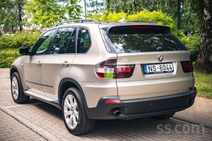 Brown BMW X5 2007 in Riga, with an engine capacity of 3.00 L and mileage of 0 thousand km for 4590 €, photo 7 on AUTOMOTO.COM.LV