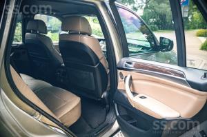 Brown BMW X5 2007 in Riga, with an engine capacity of 3.00 L and mileage of 0 thousand km for 4590 €, photo 12 on AUTOMOTO.COM.LV