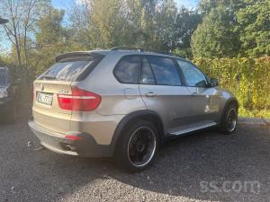 Brown BMW X5 2007 in Riga, with an engine capacity of 3.00 L and mileage of 0 thousand km for 5500 €, photo 4 on AUTOMOTO.COM.LV