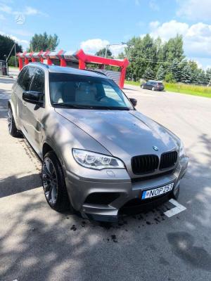Brown BMW X5 2007 in Plunge, with an engine capacity of 4.80 L and mileage of 360 thousand km for 9450 €, photo  on AUTOMOTO.COM.LV