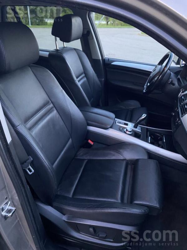 Brown BMW X5 2008 in Riga, with an engine capacity of 3.00 L and mileage of 242 thousand km for 8300 €, photo 9 on AUTOMOTO.COM.LV
