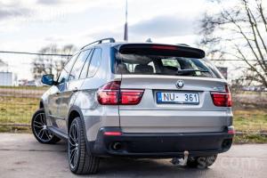Brown BMW X5 2008 in Riga, with an engine capacity of 3.00 L and mileage of 339 thousand km for 8890 €, photo 7 on AUTOMOTO.COM.LV