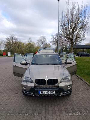 Brūns BMW X5 2009 Viljandi, ar dzinēja tilpumu 3.00 L un nobraukumu 189 tūkst. km par 10990 €, foto  vietnē AUTOMOTO.COM.LV