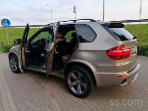 Brūns BMW X5 2009 Daugavpils, ar dzinēja tilpumu 3.00 L un nobraukumu 0 tūkst. km par 9350 €, foto 9 vietnē AUTOMOTO.COM.LV