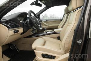 Brown BMW X5 2010 in Tukums, with an engine capacity of 3.00 L and mileage of 0 thousand km for 11999 €, photo 24 on AUTOMOTO.COM.LV