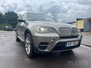 Brūns BMW X5 2010 Rīga, ar dzinēja tilpumu 3.00 L un nobraukumu 447 tūkst. km par 9200 €, foto  vietnē AUTOMOTO.COM.LV