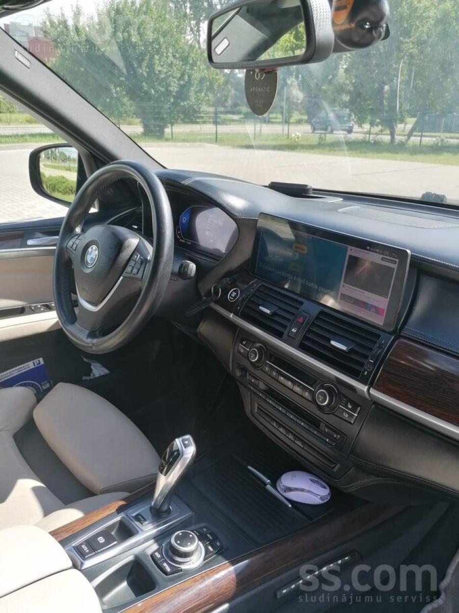Brown BMW X5 2010 in Riga, with an engine capacity of 3.00 L and mileage of 303 thousand km for 14700 €, photo 12 on AUTOMOTO.COM.LV