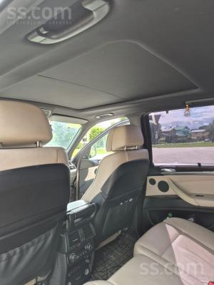 Brown BMW X5 2010 in Riga, with an engine capacity of 3.00 L and mileage of 303 thousand km for 14700 €, photo 14 on AUTOMOTO.COM.LV