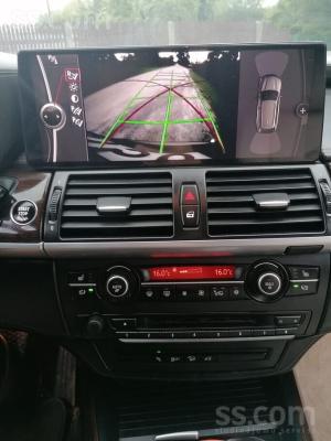 Brown BMW X5 2010 in Riga, with an engine capacity of 3.00 L and mileage of 303 thousand km for 14700 €, photo 16 on AUTOMOTO.COM.LV