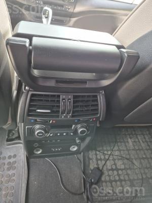 Brown BMW X5 2010 in Riga, with an engine capacity of 3.00 L and mileage of 303 thousand km for 14700 €, photo 19 on AUTOMOTO.COM.LV