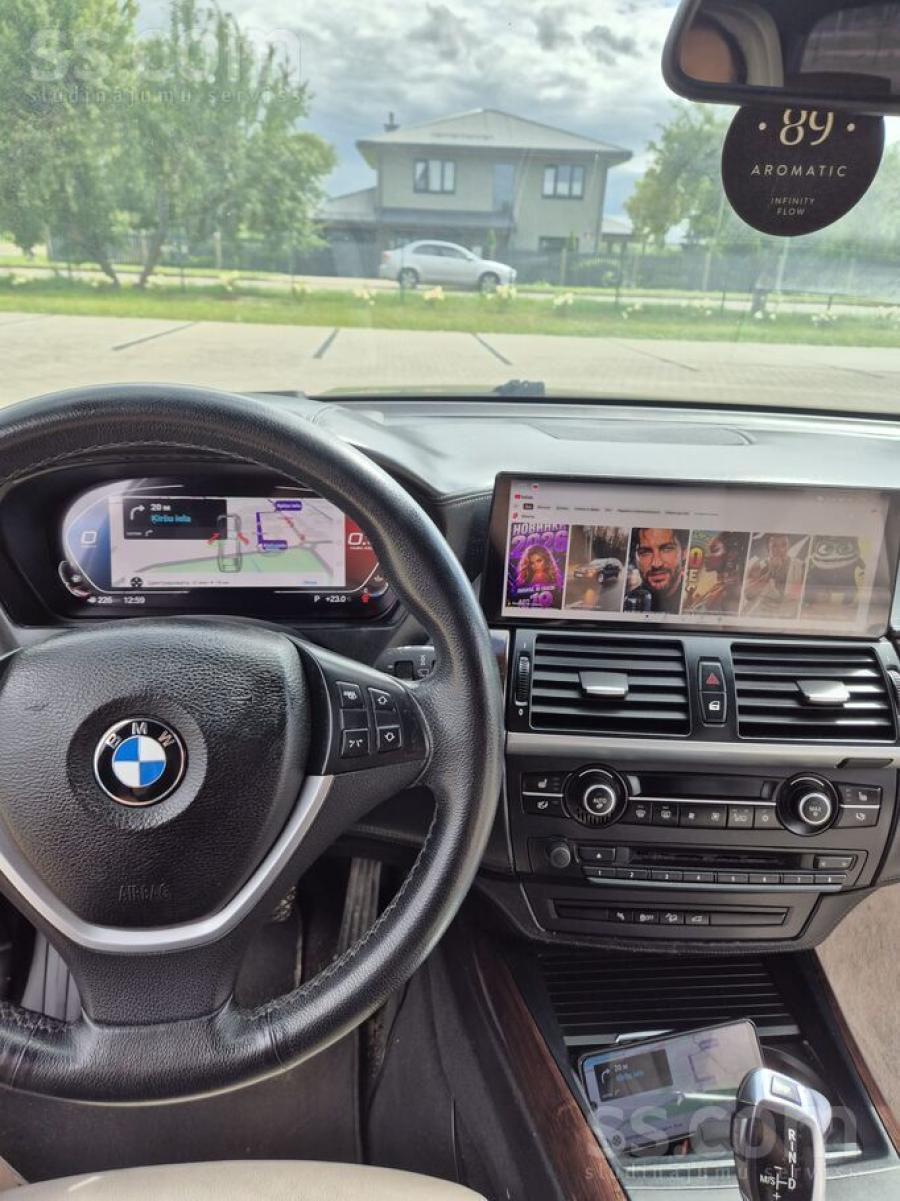 Brown BMW X5 2010 in Riga, with an engine capacity of 3.00 L and mileage of 303 thousand km for 14700 €, photo 21 on AUTOMOTO.COM.LV