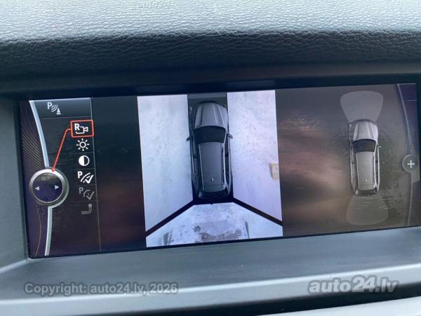 Brown BMW X5 2011 in Parnu, with an engine capacity of 3.00 L and mileage of 334 thousand km for 11490 €, photo 11 on AUTOMOTO.COM.LV