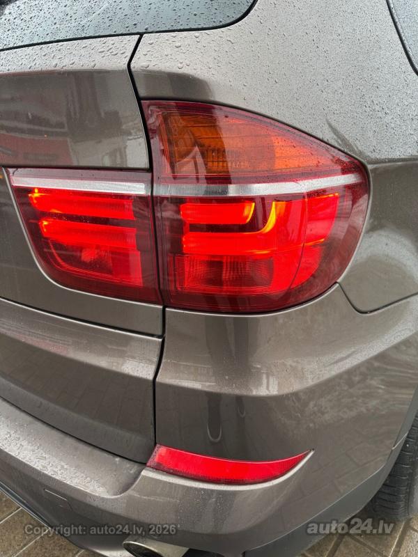 Brown BMW X5 2011 in Tallinn, with an engine capacity of 3.00 L and mileage of 222 thousand km for 13800 €, photo 11 on AUTOMOTO.COM.LV