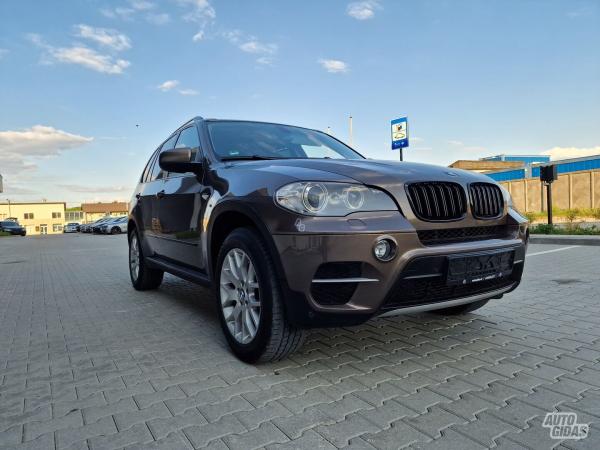 Brown BMW X5 2011 in Vilnius, with an engine capacity of 3.00 L and mileage of 259 thousand km for 9890 €, photo 4 on AUTOMOTO.COM.LV