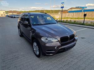 Brown BMW X5 2011 in Vilnius, with an engine capacity of 3.00 L and mileage of 259 thousand km for 9890 €, photo 4 on AUTOMOTO.COM.LV