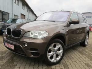 Brown BMW X5 2011 in Riga, with an engine capacity of 3.00 L and mileage of 300 thousand km for 9990 €, photo  on AUTOMOTO.COM.LV