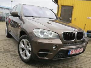 Brown BMW X5 2011 in Riga, with an engine capacity of 3.00 L and mileage of 300 thousand km for 9990 €, photo 4 on AUTOMOTO.COM.LV