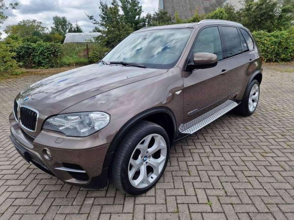 Brown BMW X5 2011 in Panevezys, with an engine capacity of 3.00 L and mileage of 257 thousand km for 10499 €, photo 1 on AUTOMOTO.COM.LV