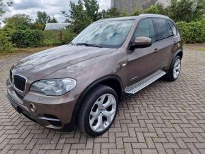 Brown BMW X5 2011 in Panevezys, with an engine capacity of 3.00 L and mileage of 257 thousand km for 10499 €, photo  on AUTOMOTO.COM.LV
