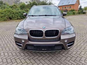 Brown BMW X5 2011 in Panevezys, with an engine capacity of 3.00 L and mileage of 257 thousand km for 10499 €, photo 3 on AUTOMOTO.COM.LV