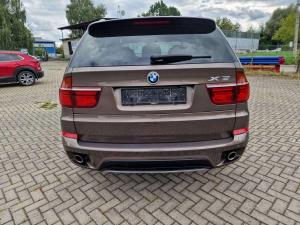 Brown BMW X5 2011 in Panevezys, with an engine capacity of 3.00 L and mileage of 257 thousand km for 10499 €, photo 7 on AUTOMOTO.COM.LV