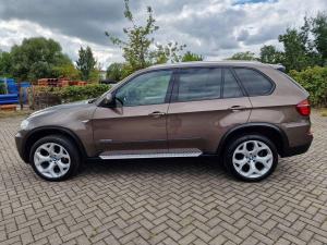Brown BMW X5 2011 in Panevezys, with an engine capacity of 3.00 L and mileage of 257 thousand km for 10499 €, photo 9 on AUTOMOTO.COM.LV