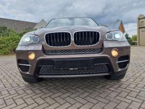 Brown BMW X5 2011 in Panevezys, with an engine capacity of 3.00 L and mileage of 257 thousand km for 10499 €, photo 10 on AUTOMOTO.COM.LV