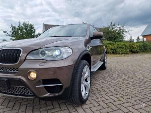 Brown BMW X5 2011 in Panevezys, with an engine capacity of 3.00 L and mileage of 257 thousand km for 10499 €, photo 12 on AUTOMOTO.COM.LV