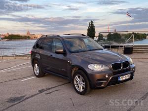 Brūns BMW X5 2011 Rīga, ar dzinēja tilpumu 3.00 L un nobraukumu 285 tūkst. km par 9800 €, foto  vietnē AUTOMOTO.COM.LV