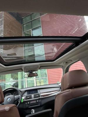 Brown BMW X5 2011 in Klaipeda, with an engine capacity of 2.99 L and mileage of 248 thousand km for 11900 €, photo 18 on AUTOMOTO.COM.LV