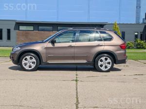 Brown BMW X5 2011 in Riga, with an engine capacity of 3.00 L and mileage of 280 thousand km for 12590 €, photo 8 on AUTOMOTO.COM.LV
