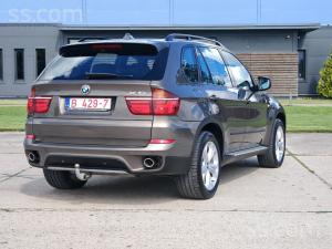 Brown BMW X5 2011 in Riga, with an engine capacity of 3.00 L and mileage of 280 thousand km for 12590 €, photo 12 on AUTOMOTO.COM.LV