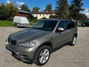 Brūns BMW X5 2011 Tallina, ar dzinēja tilpumu 3.00 L un nobraukumu 304 tūkst. km par 10500 €, foto  vietnē AUTOMOTO.COM.LV