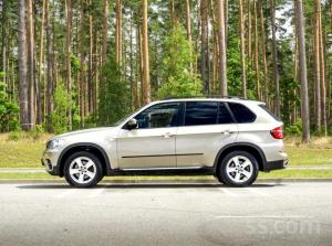 Brown BMW X5 2012 in Riga, with an engine capacity of 3.00 L and mileage of 233 thousand km for 11490 €, photo 5 on AUTOMOTO.COM.LV