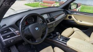 Brown BMW X5 2012 in Riga, with an engine capacity of 3.00 L and mileage of 233 thousand km for 11490 €, photo 10 on AUTOMOTO.COM.LV