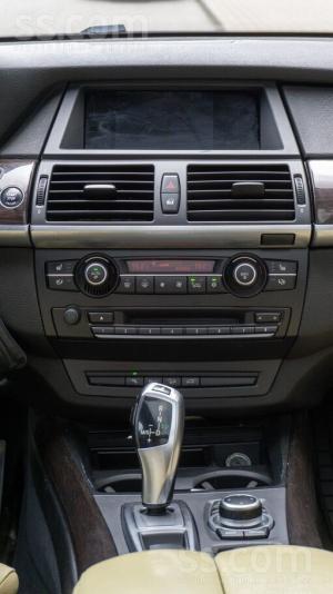 Brown BMW X5 2012 in Riga, with an engine capacity of 3.00 L and mileage of 233 thousand km for 11490 €, photo 13 on AUTOMOTO.COM.LV