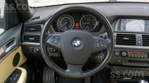 Brown BMW X5 2012 in Riga, with an engine capacity of 3.00 L and mileage of 233 thousand km for 11490 €, photo 14 on AUTOMOTO.COM.LV