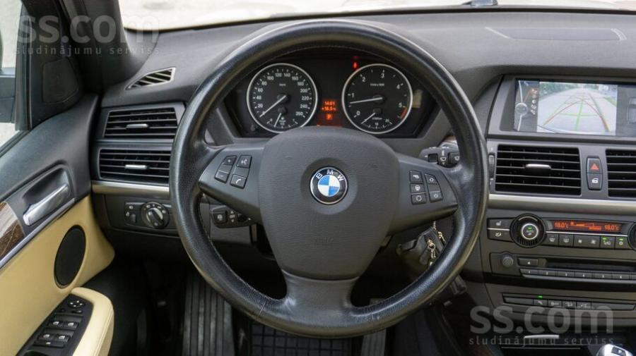 Brown BMW X5 2012 in Riga, with an engine capacity of 3.00 L and mileage of 233 thousand km for 11490 €, photo 14 on AUTOMOTO.COM.LV