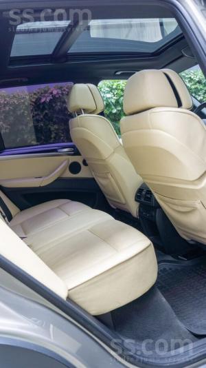 Brown BMW X5 2012 in Riga, with an engine capacity of 3.00 L and mileage of 233 thousand km for 11490 €, photo 30 on AUTOMOTO.COM.LV