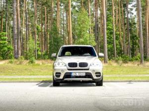 Brown BMW X5 2012 in Riga, with an engine capacity of 3.00 L and mileage of 233 thousand km for 10590 €, photo 4 on AUTOMOTO.COM.LV