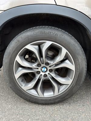 Brown BMW X5 2012 in Vilnius, with an engine capacity of 3.00 L and mileage of 227 thousand km for 9000 €, photo 28 on AUTOMOTO.COM.LV