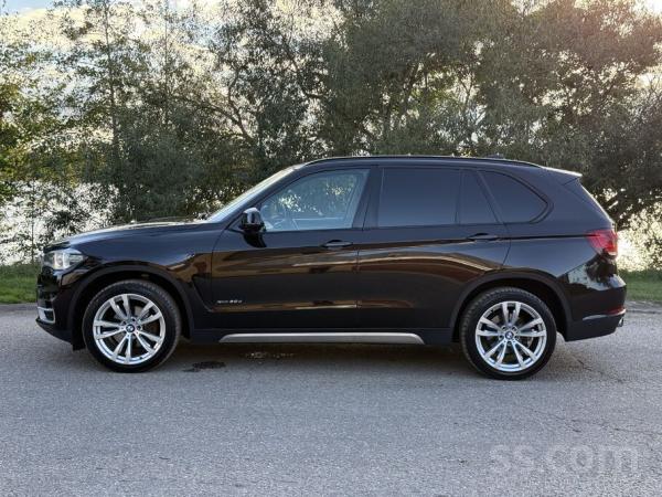 Brown BMW X5 2013 in Riga, with an engine capacity of 3.00 L and mileage of 225 thousand km for 20500 €, photo 6 on AUTOMOTO.COM.LV