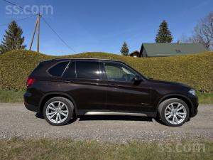 Brūns BMW X5 2013 Rīga, ar dzinēja tilpumu 3.00 L un nobraukumu 235 tūkst. km par 16990 €, foto 7 vietnē AUTOMOTO.COM.LV
