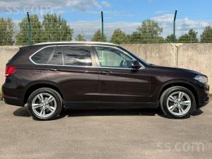 Brown BMW X5 2013 in Ogre, with an engine capacity of 3.00 L and mileage of 250 thousand km for 17500 €, photo 4 on AUTOMOTO.COM.LV