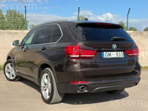 Brown BMW X5 2013 in Ogre, with an engine capacity of 3.00 L and mileage of 250 thousand km for 17500 €, photo 6 on AUTOMOTO.COM.LV