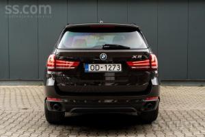 Brown BMW X5 2013 in Riga, with an engine capacity of 3.00 L and mileage of 249 thousand km for 16000 €, photo 6 on AUTOMOTO.COM.LV