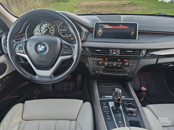 Brown BMW X5 2014 in Vilnius, with an engine capacity of 3.00 L and mileage of 300 thousand km for 14200 €, photo 11 on AUTOMOTO.COM.LV