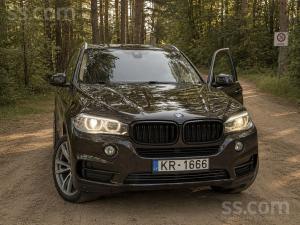 Brown BMW X5 2014 in Riga, with an engine capacity of 2.00 L and mileage of 196 thousand km for 19190 €, photo 3 on AUTOMOTO.COM.LV