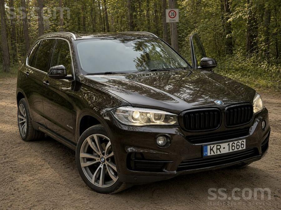Brown BMW X5 2014 in Riga, with an engine capacity of 2.00 L and mileage of 196 thousand km for 19190 €, photo 4 on AUTOMOTO.COM.LV